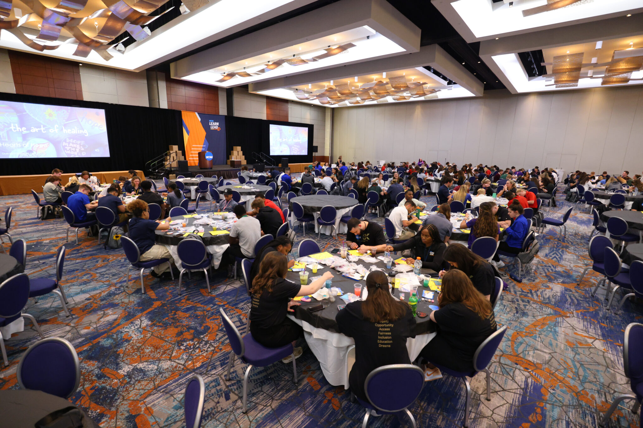 NCAA Student-Athletes Paint Hearts of Hope in Moving Event - Hearts of Hope
